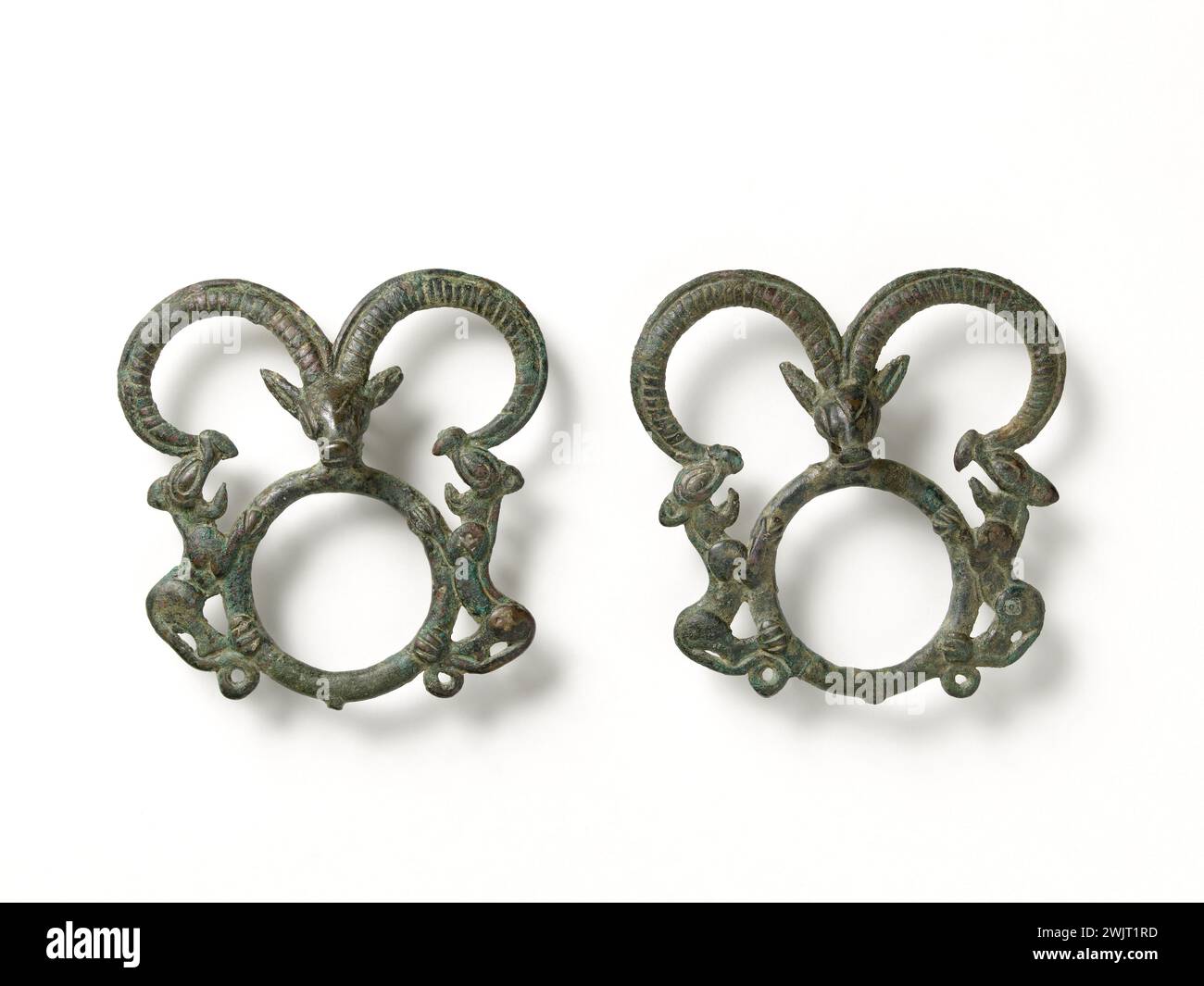 Big loop. Surmounted by a ring on which two animals stand. LURISTAN ...