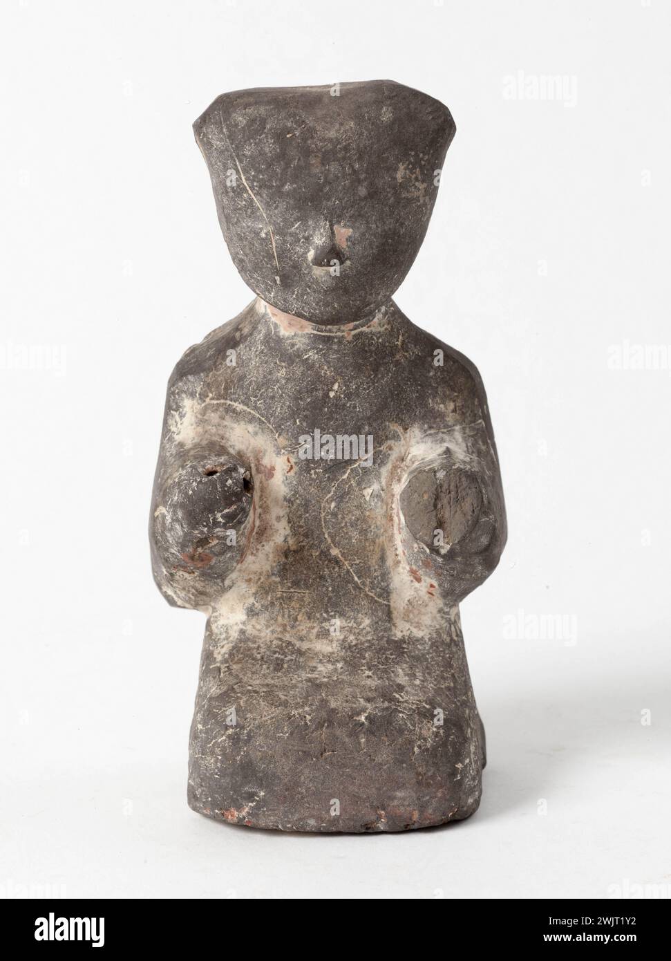 Mingqi: Sitted character ". Terracotta, traces of coating and ...