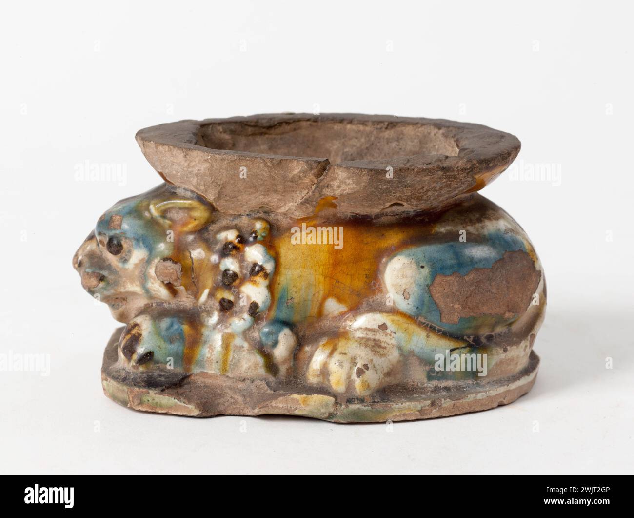 Container in the shape of an elongated feline ". Terracotta, polychrome ...