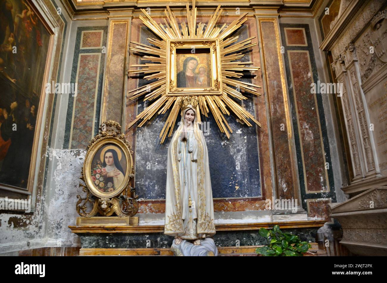 virgin mary statue in the Santi Vincenzo e Anastasio a Fontana di Trevi ...