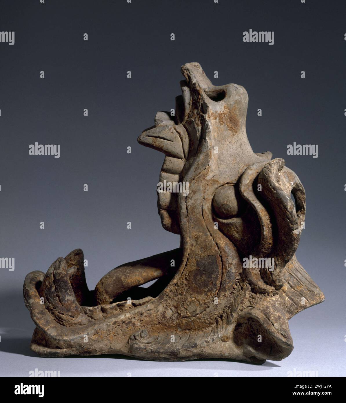 Decorative element in the shape of a dragon head. Terracotta, China ...