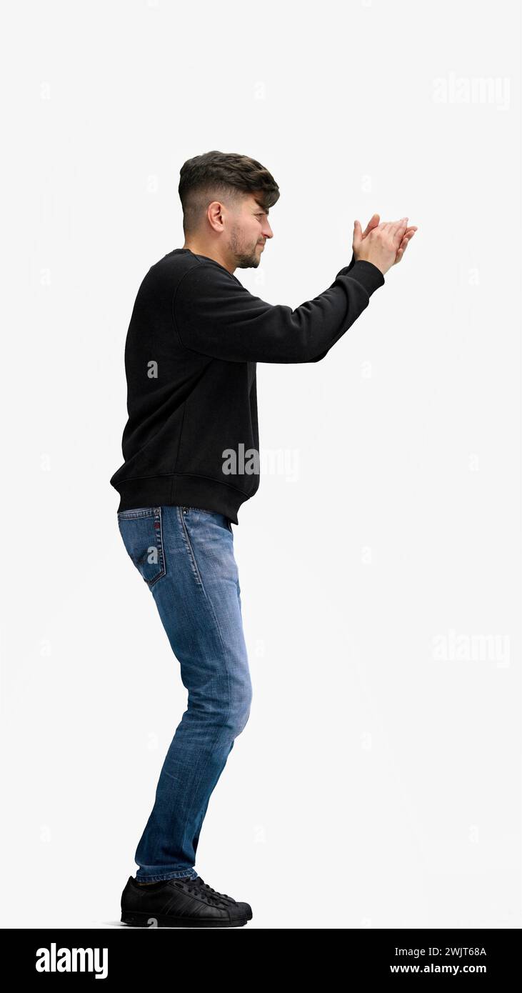A man, full-length, on a white background, claps Stock Photo - Alamy