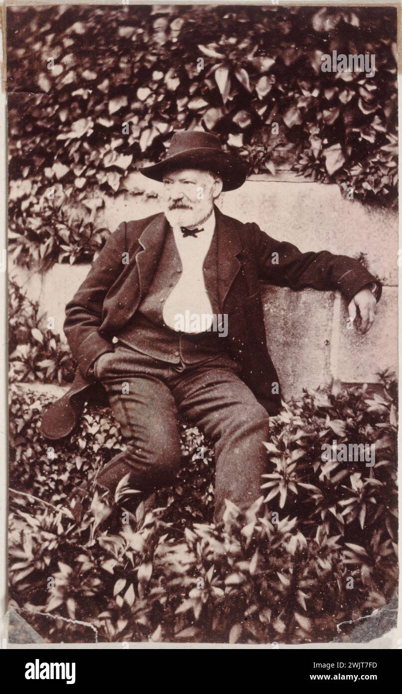 Victor Hugo seated in the garden of Hauteville House. Photograph by ...
