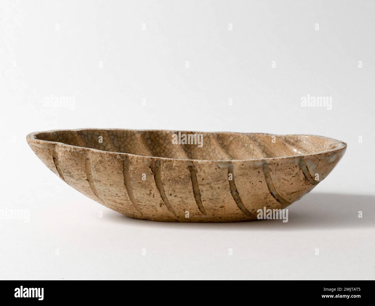 Cup (Mukozuke). Beige terracotta, cracked transparent glaze, raku style ...