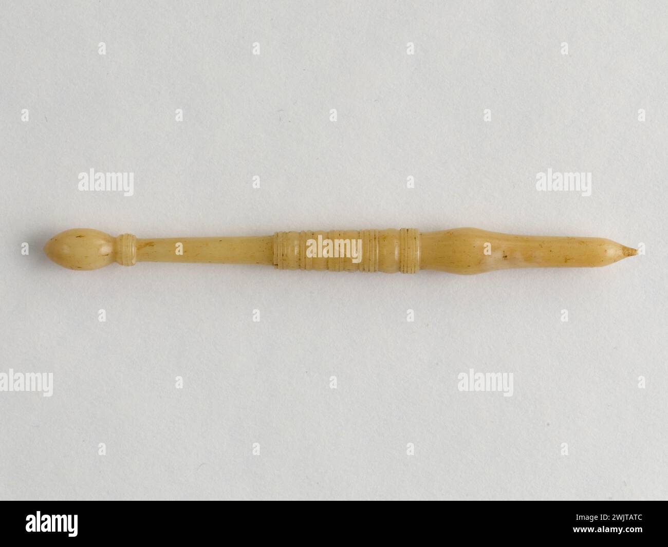 Spindle. Gallo-Roman. Bone. Paris, Carnavalet museum. The molded decor ...