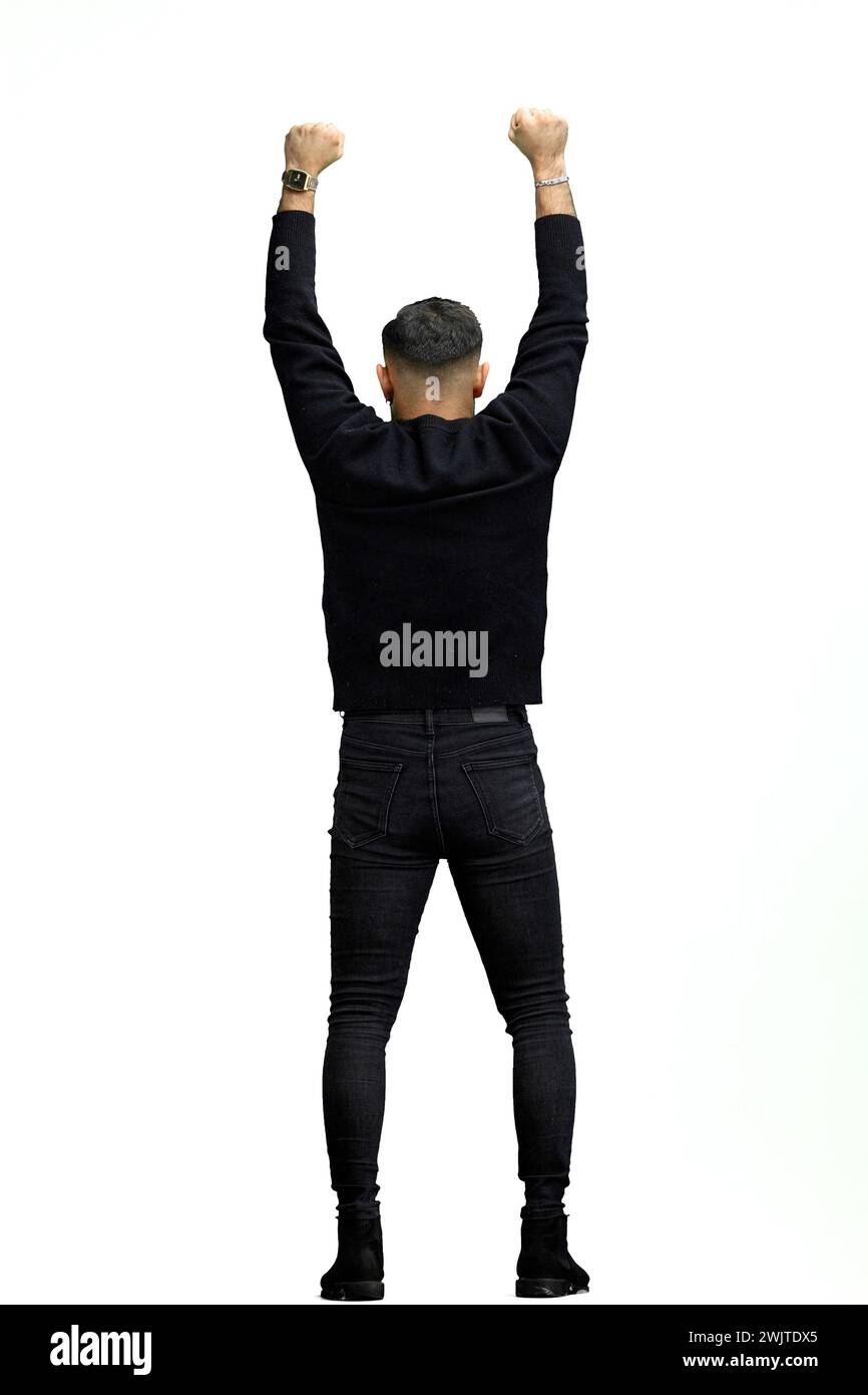 A man, full-length, on a white background, raised his hands up Stock ...