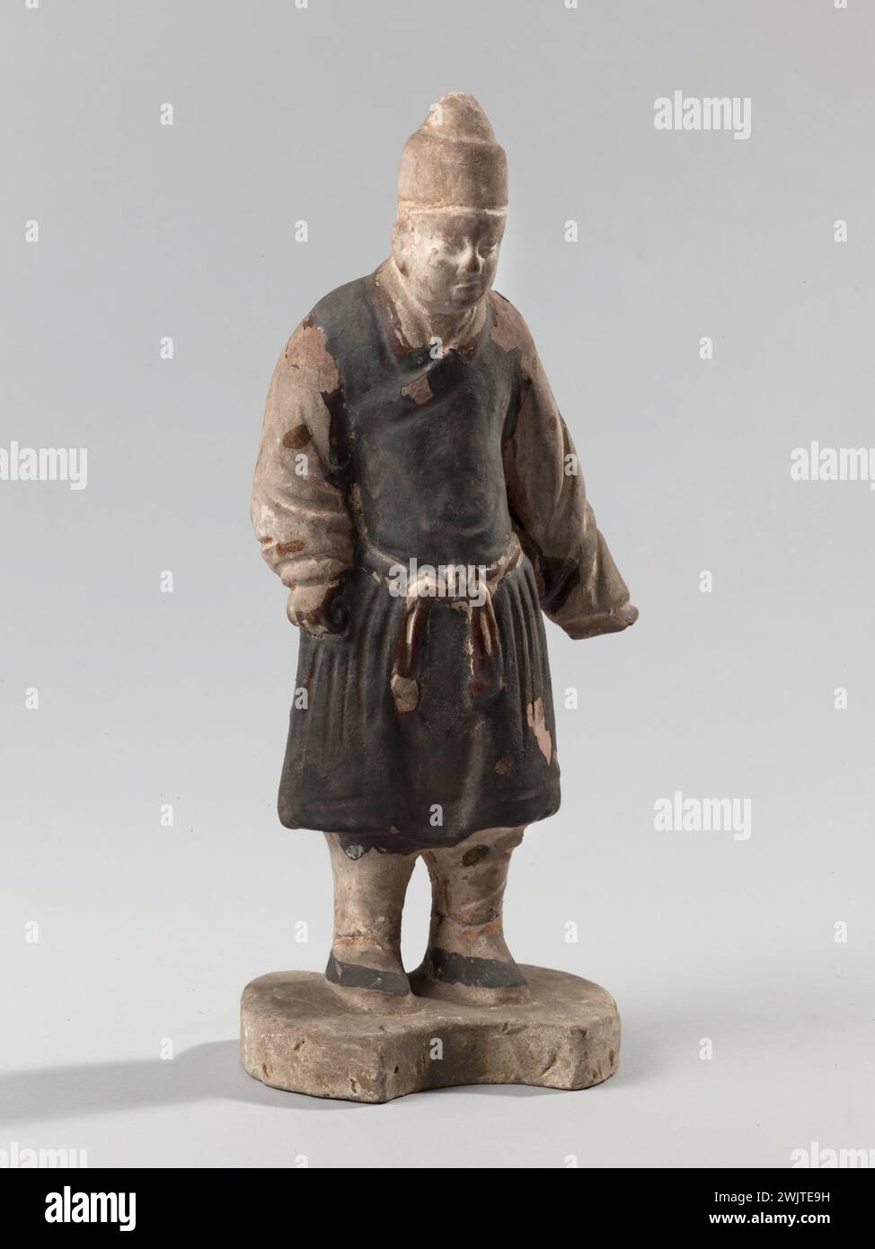Male character mingqi. Terracotta, brown glaze, traces of polychromy ...