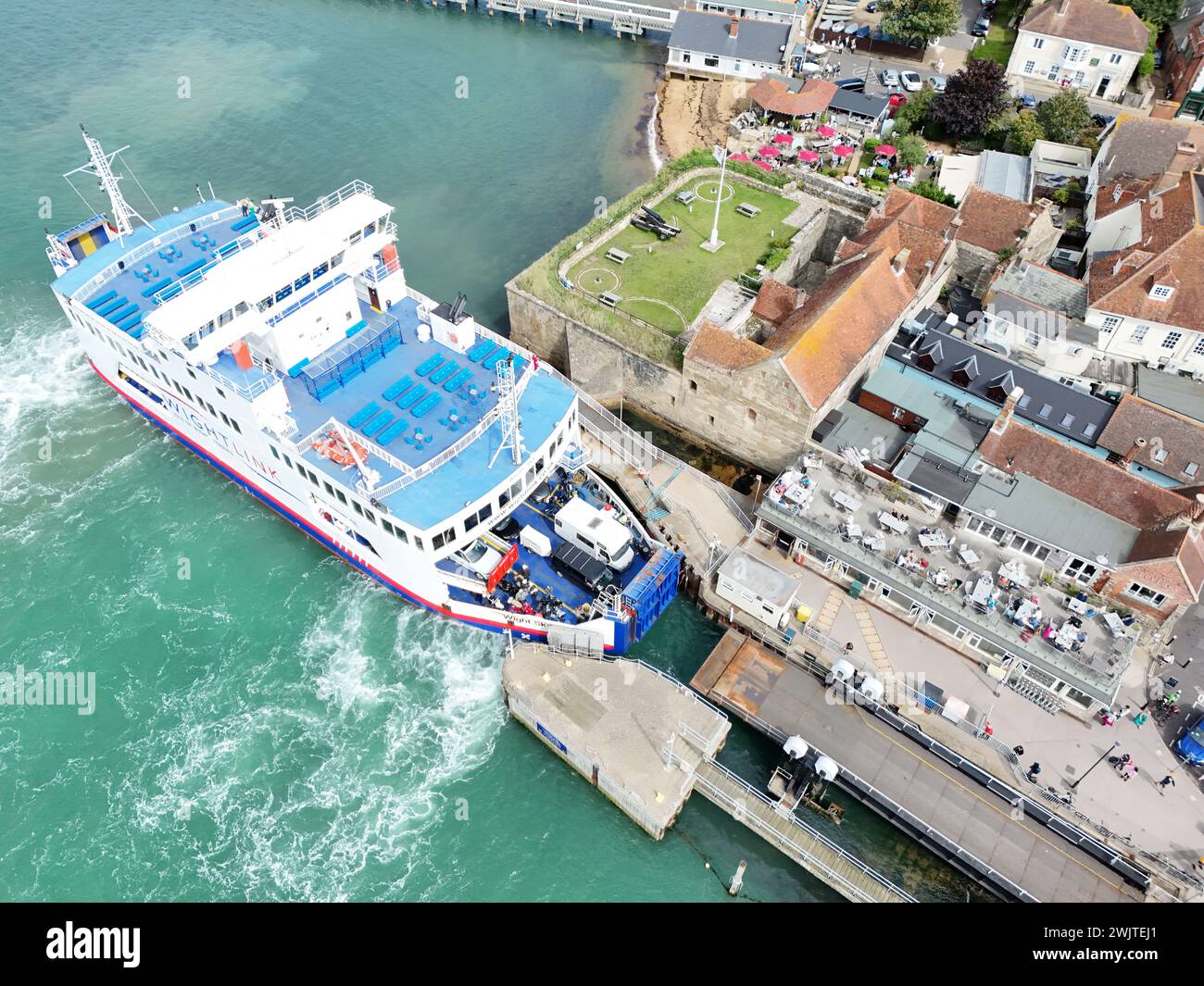 Overhead birds eye drone aerial view Wight Link ferry docked at ...
