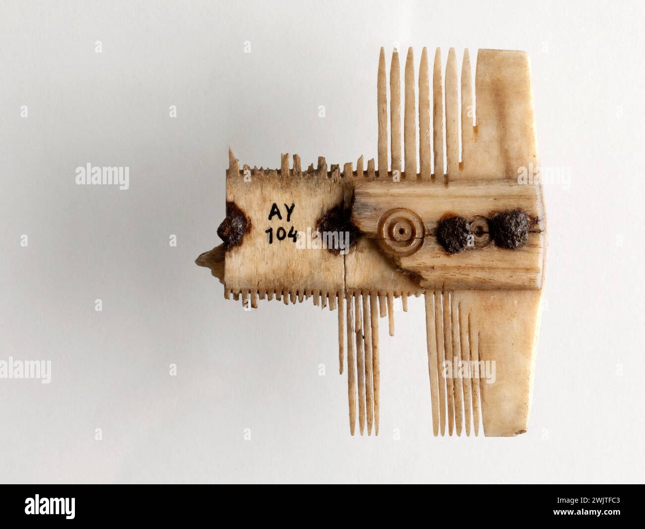 Anonymous. Bone comb (fragment: end). OS with iron rivets. 6th century ...