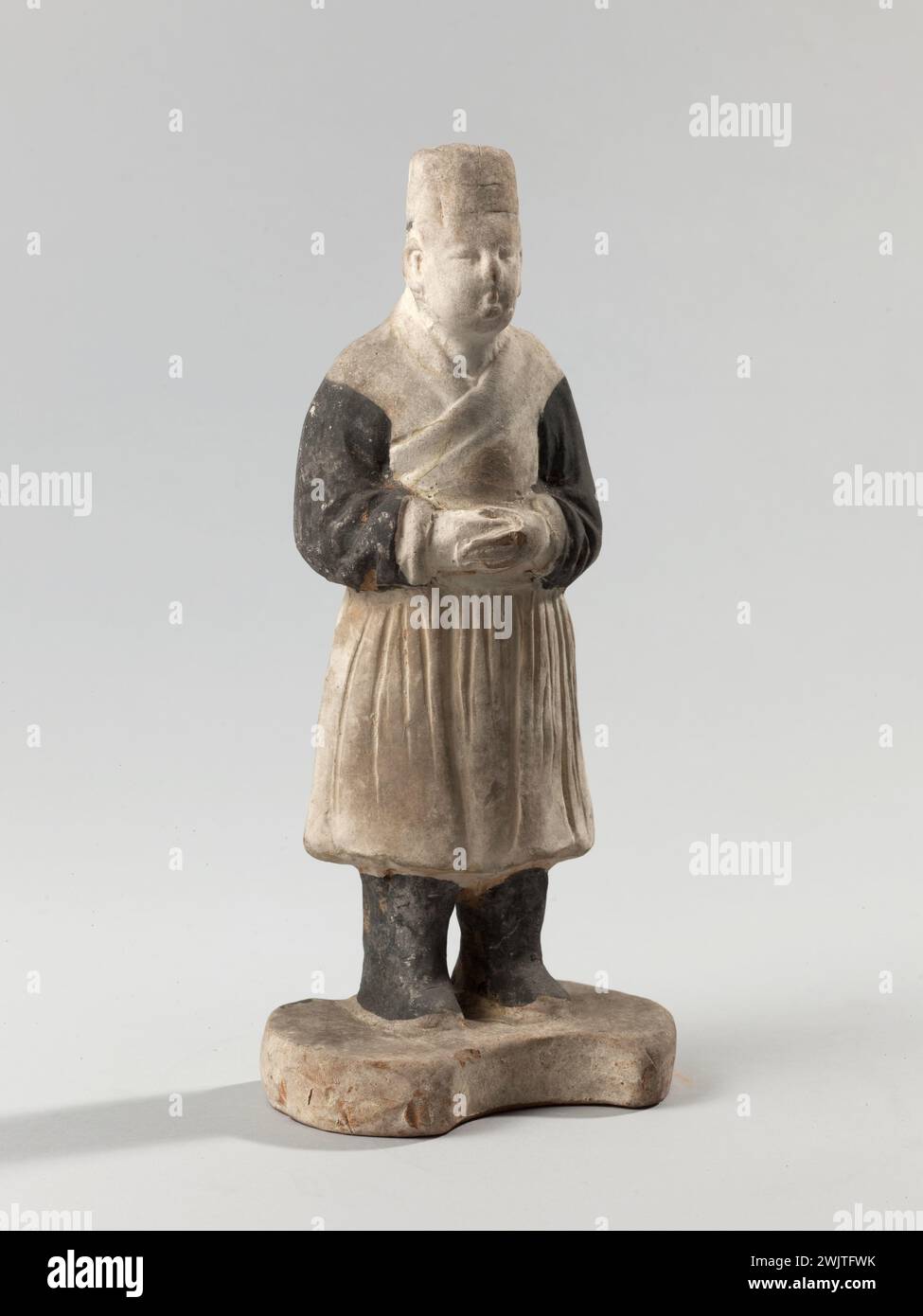 Male character mingqi. Terracotta, brown glaze, traces of polychromy ...