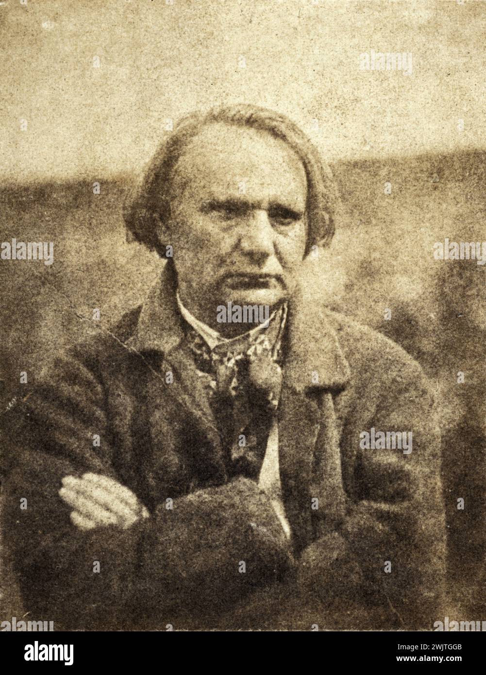 Victor Hugo, his arms crossed, his right hand slipped inside his jacket ...