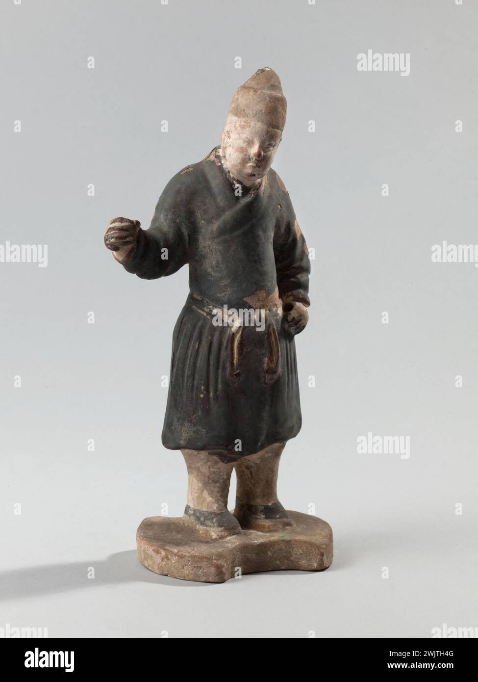 Male character mingqi. Terracotta, brown glaze, traces of polychromy ...
