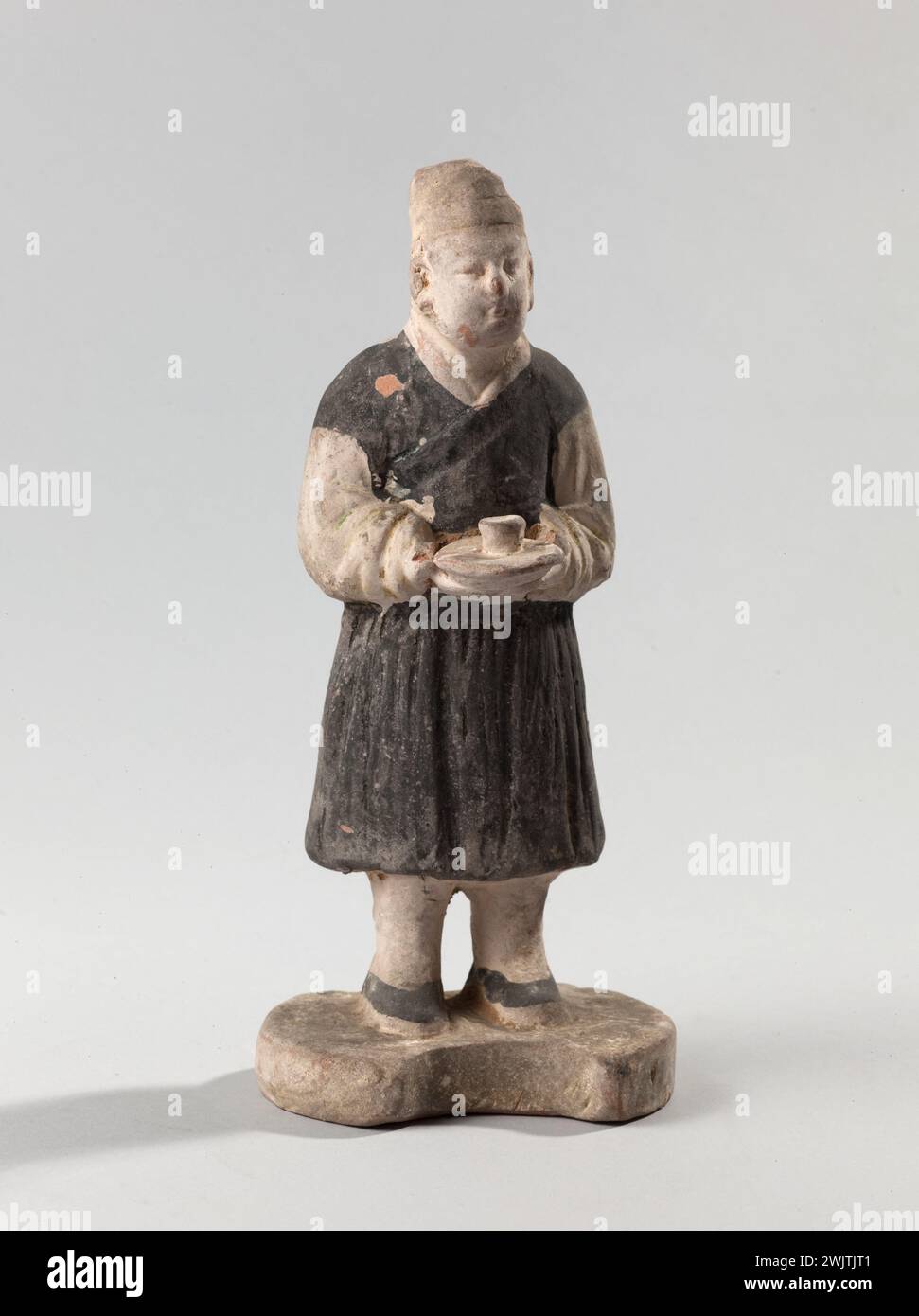 Male character mingqi. Terracotta, brown glaze, traces of polychromy ...