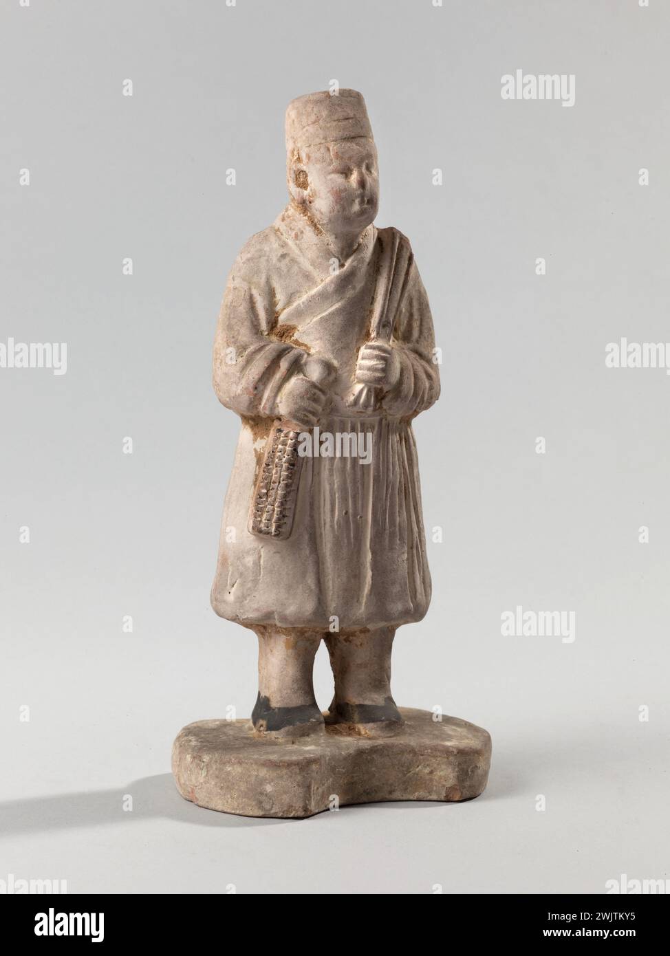 Male character mingqi. Terracotta, dark brown glaze and traces of ...
