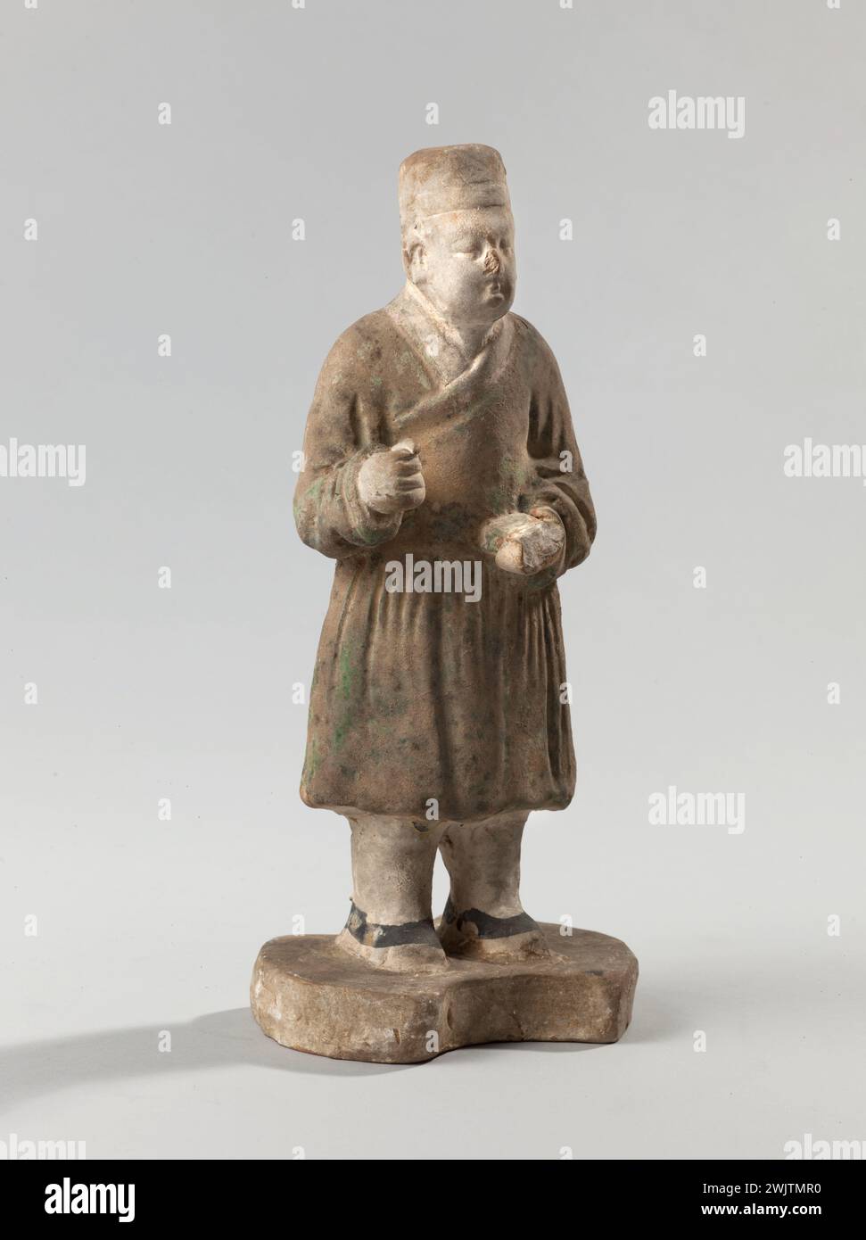 Male character mingqi. Terracotta, traces of green and brown glaze ...