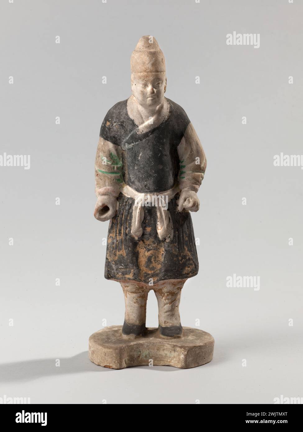 Male character mingqi. Terracotta, brown glaze, traces of polychromy ...