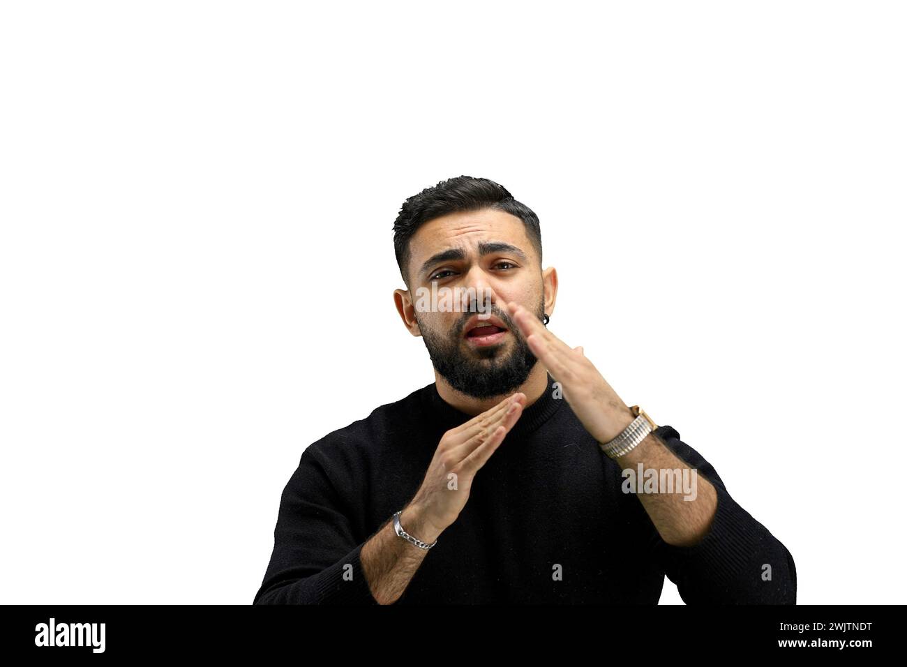 A man, close-up, on a white background, shows a pause sign Stock Photo ...