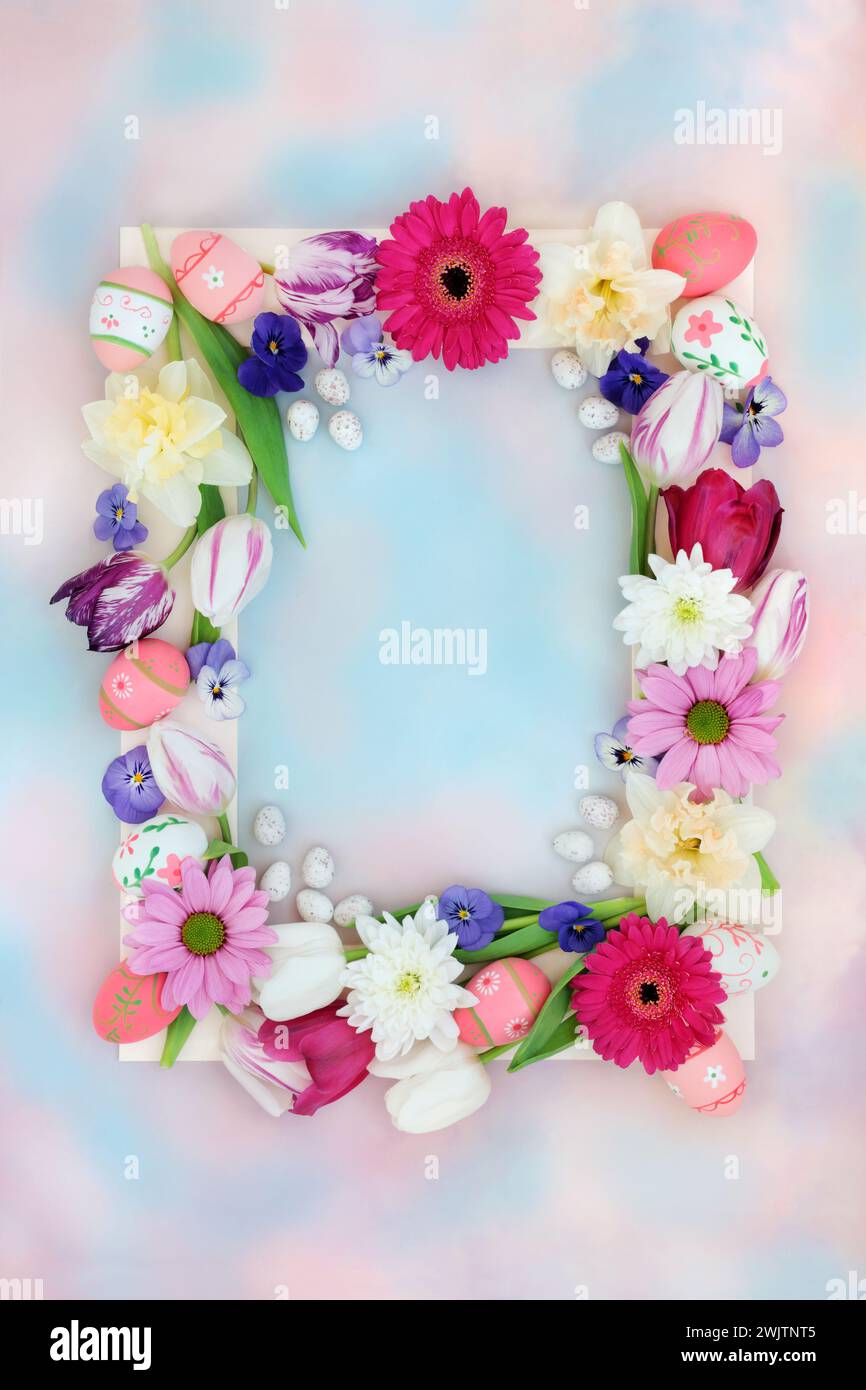 Decorative Easter background border with eggs, flowers on pastel blue ...