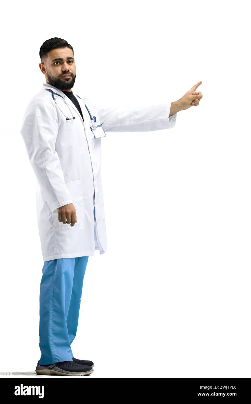 The doctor, in full height, on a white background, shows a forbidding ...