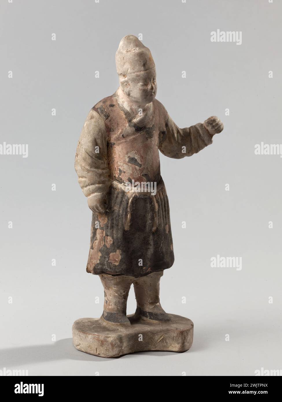 Male character mingqi. Terracotta coated with brown glaze, traces of ...