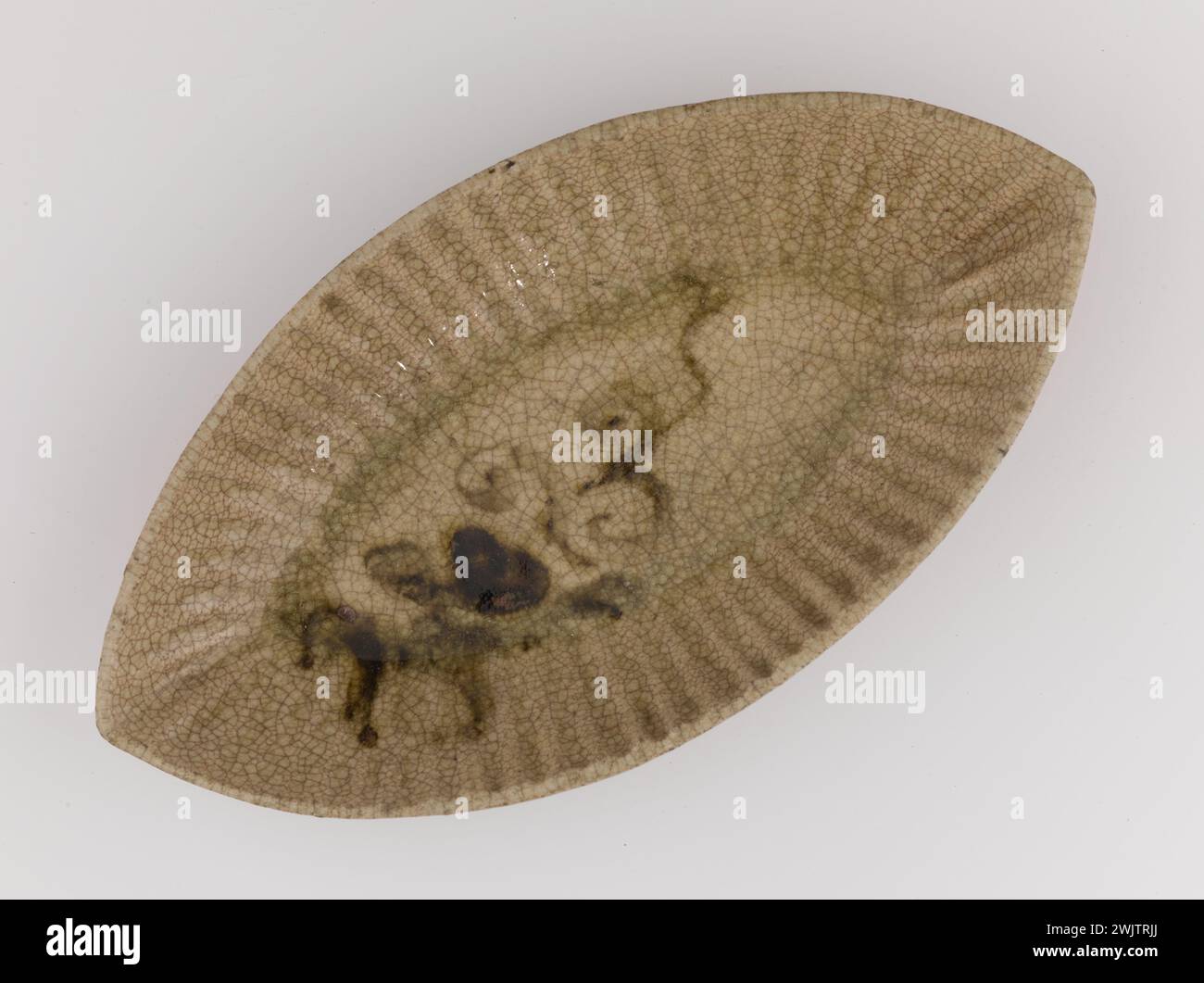 Ravier. Sandstone, Céladon covered, iron brown under the cover. Paris ...