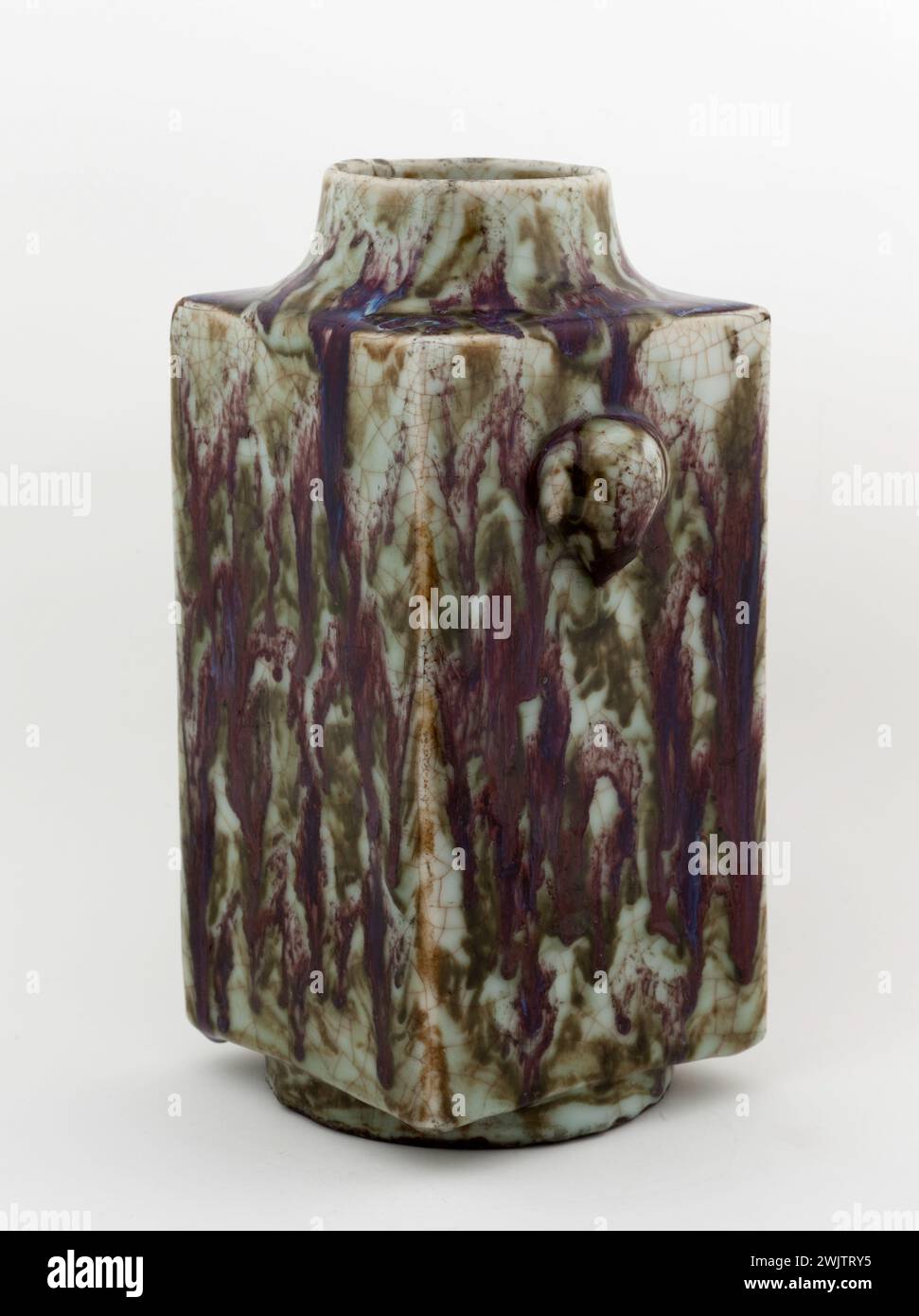 Vase. Celadon covered porcelain animated by green and purple purple ...