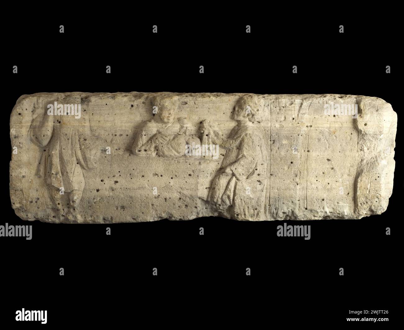 Fragment of a funeral stele representing a trading scene. Limestone ...