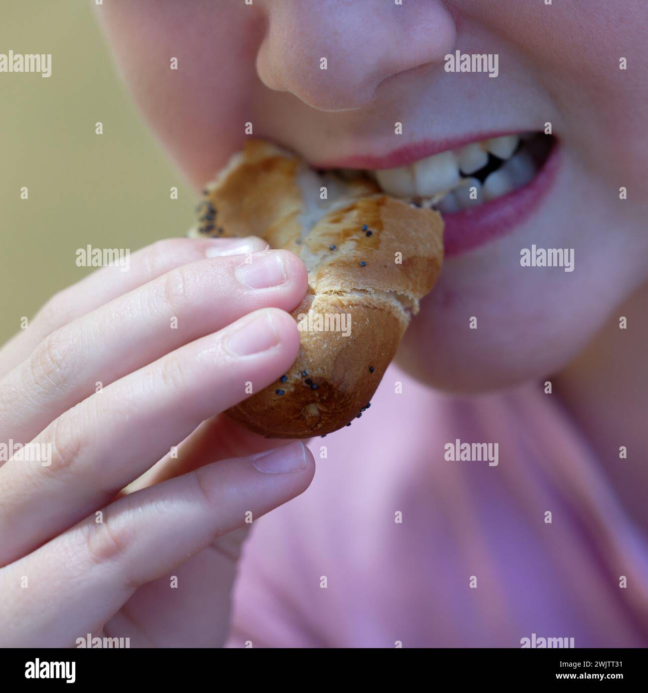 Young girl - child eating candy and sweets. Detail of face and mouth ...