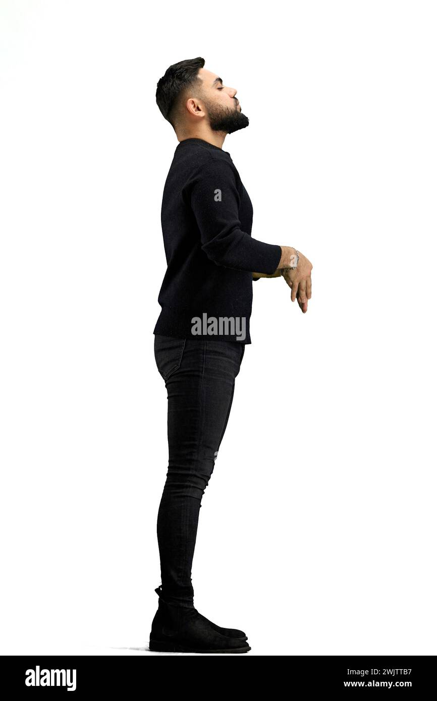 A man, in full height, on a white background, meditates Stock Photo - Alamy