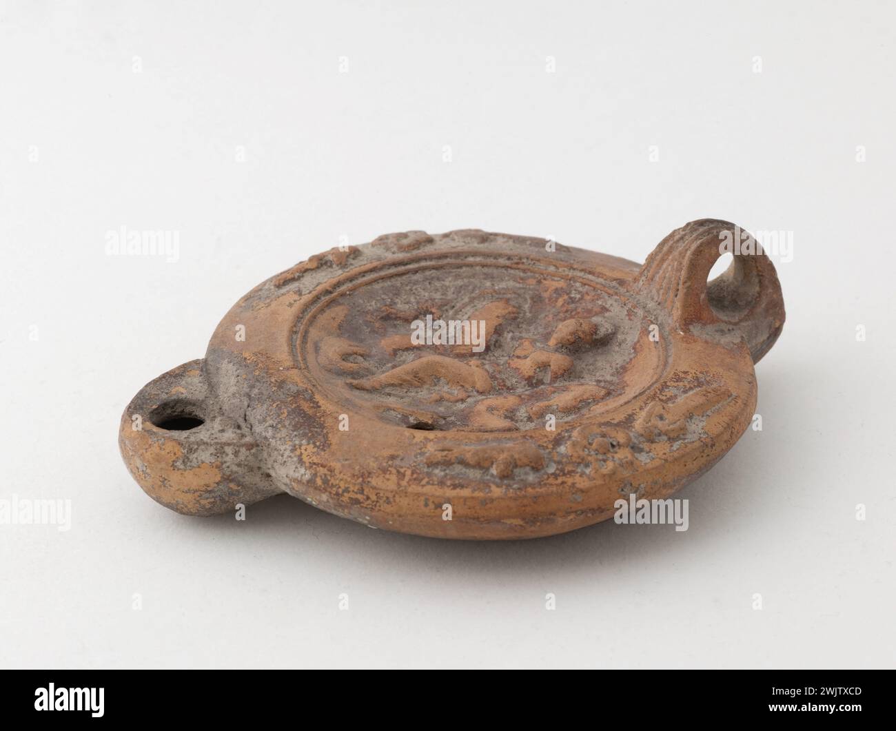 Lamp. Coll. Capitan. Terracotta. In the shape of a human head. Paris ...