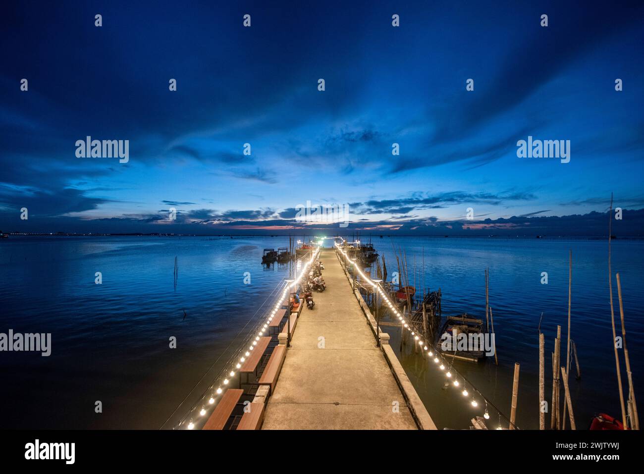 a fishing Boat pier on coast Road Bridge at the city centre of Mueang ...
