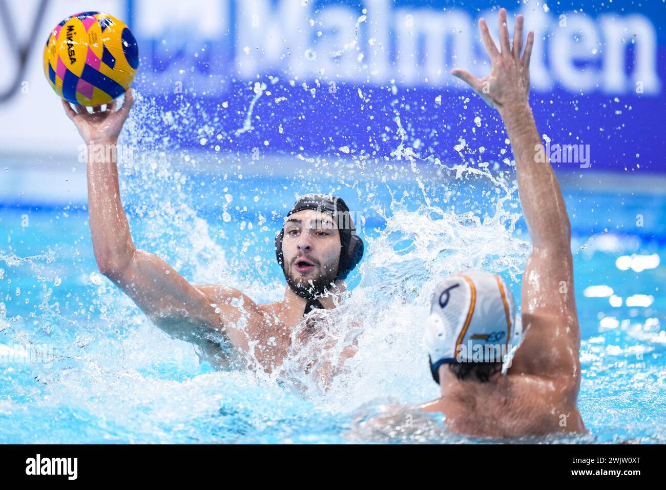 Doha, Qatar. 17th Feb, 2024. Alexandre Bouet(L) of France competes ...