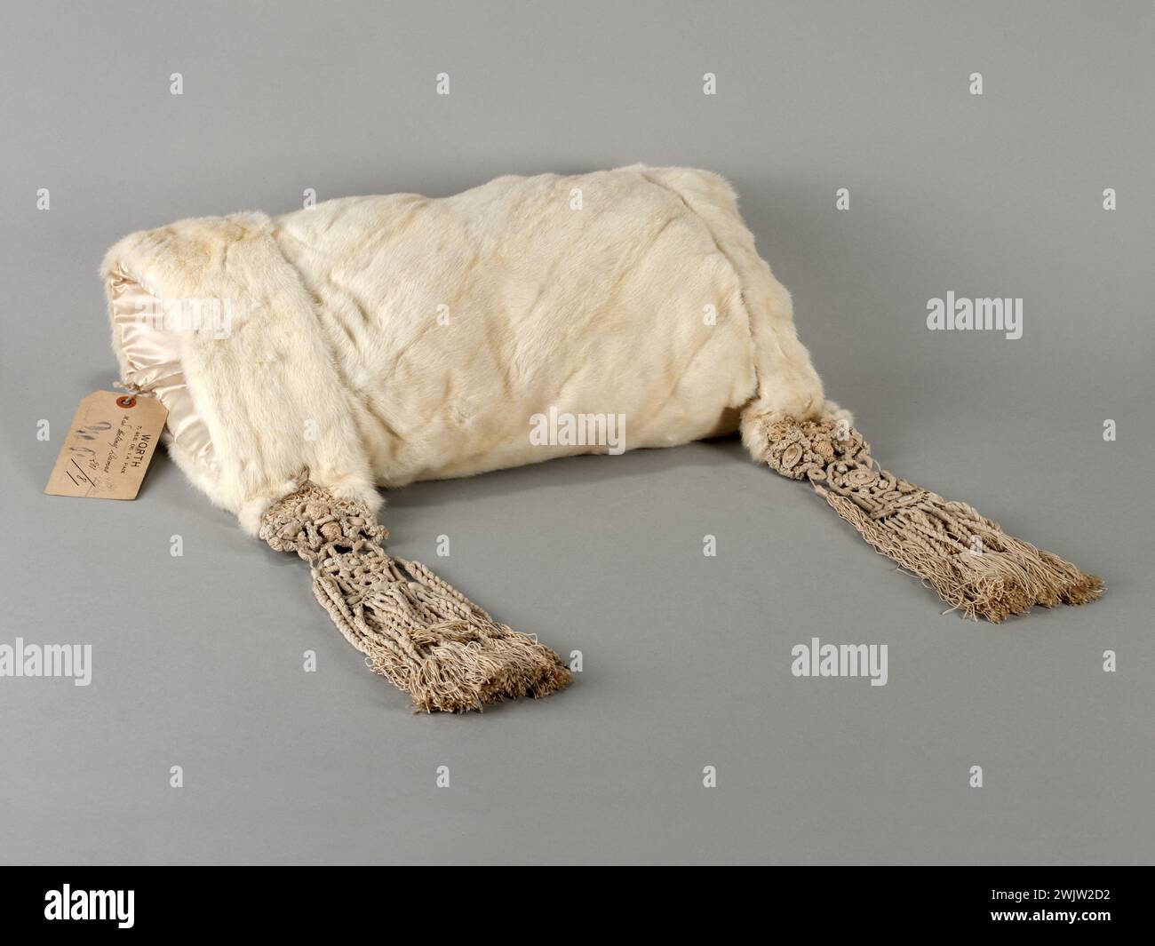 Worth. "Muff". Ermine. Ivory switchboard. Ivory satin lining. Around ...