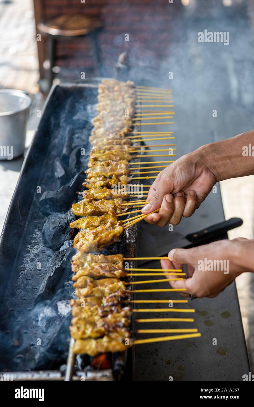 Chicken Satay grill at Market street in the city centre of Mueang ...