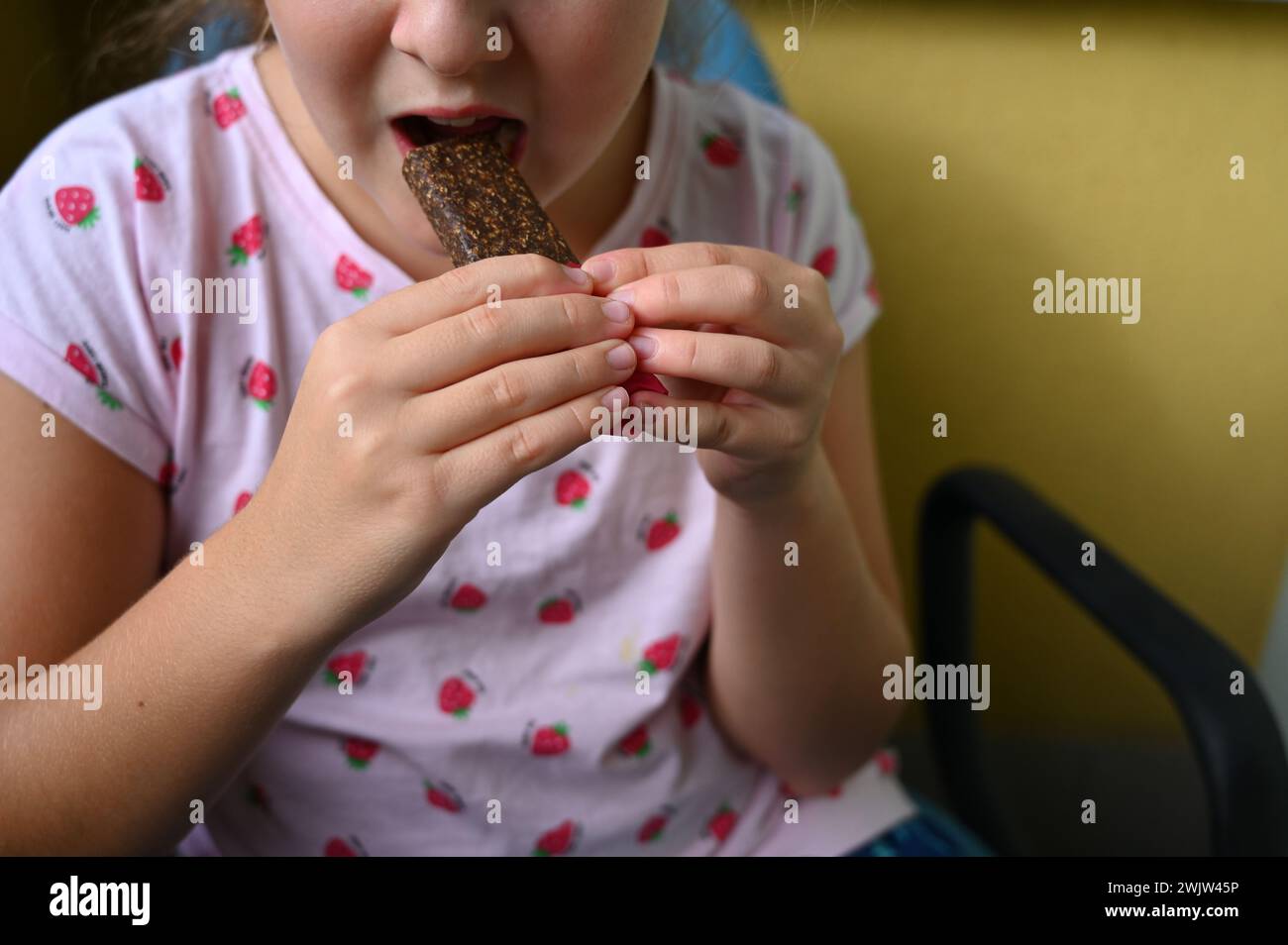 Young girl - child eating candy and sweets. Detail of face and mouth ...