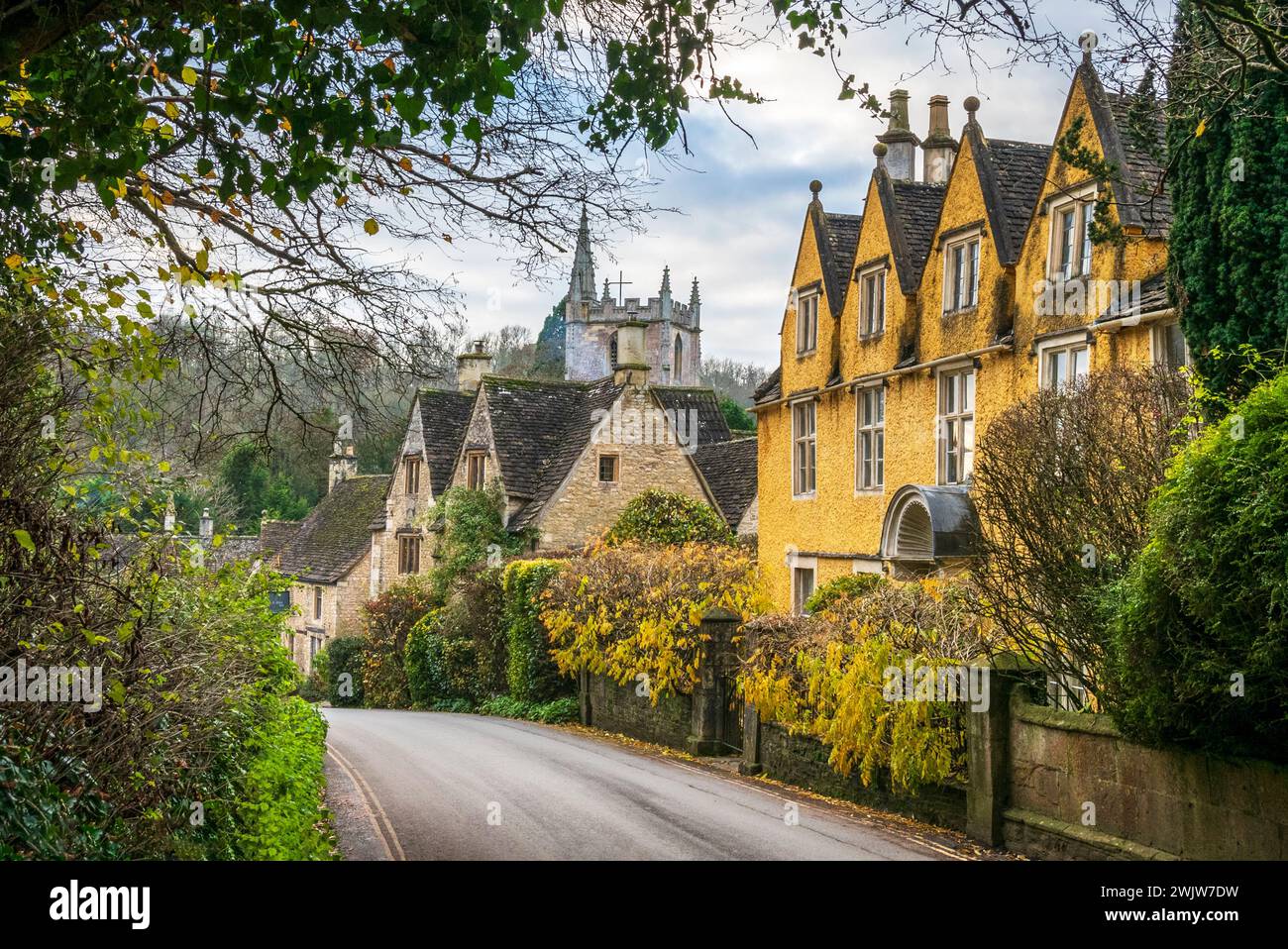 Castle Coombe, a pretty village in Wiltshire, which has many visitors ...