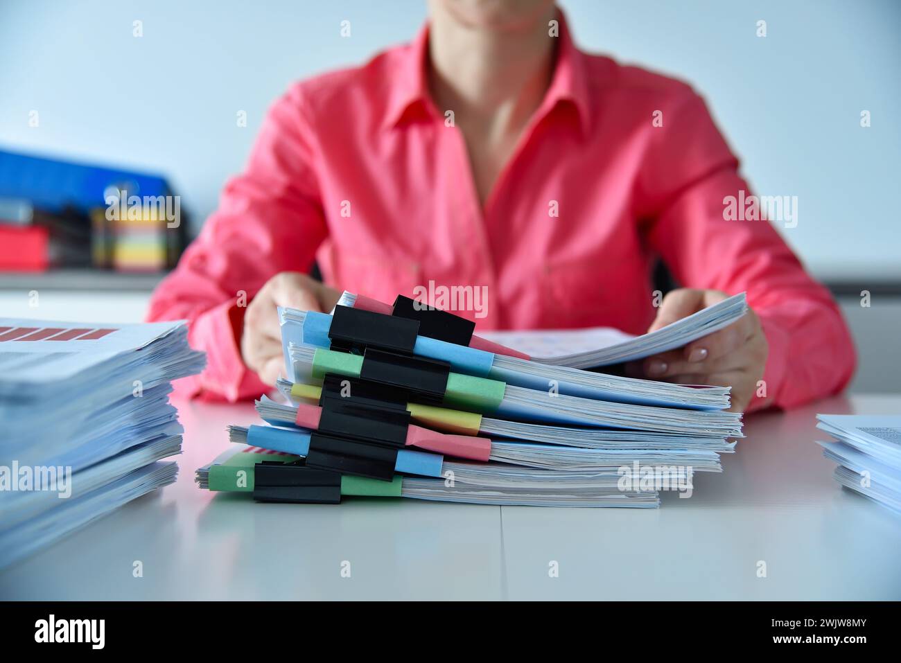 Woman holding files work hi-res stock photography and images - Alamy