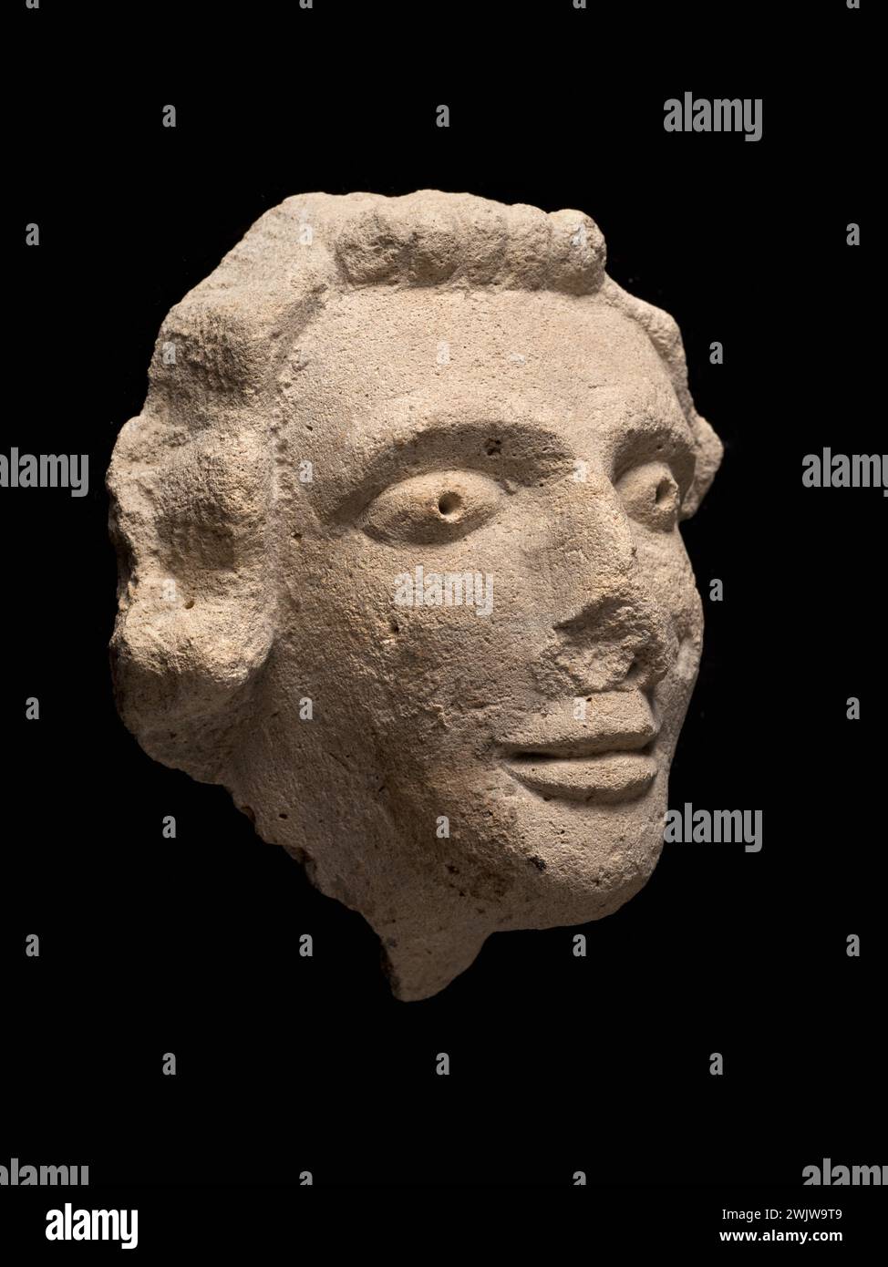 Male head beardless and smiling with broken nose. Pierre, 1450-1550 ...