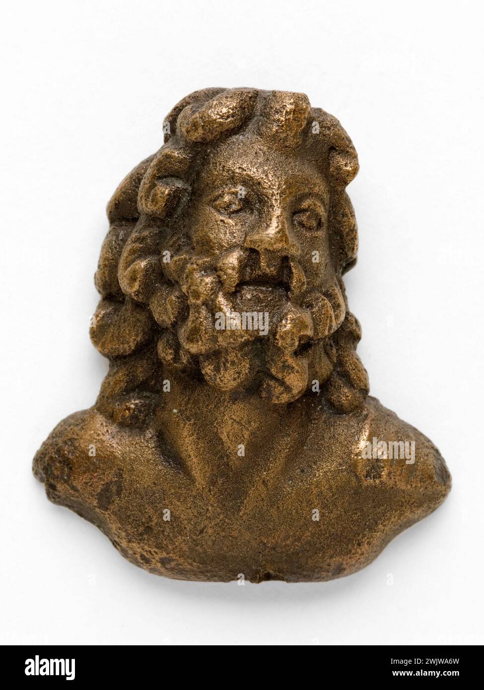 Applique decor to the bust of Jupiter. Copper alloy. Gallo-Roman time ...