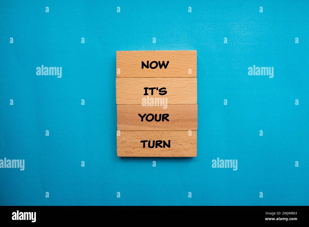 Now Its Your Turn Words Written On Wooden Blocks With Blue Background Conceptual Business