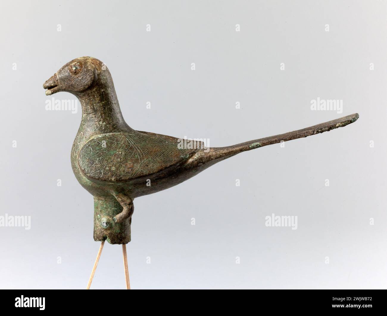 Bird -shaped emblem. Bronze. Excavations of Olov Janse, necropolis of ...