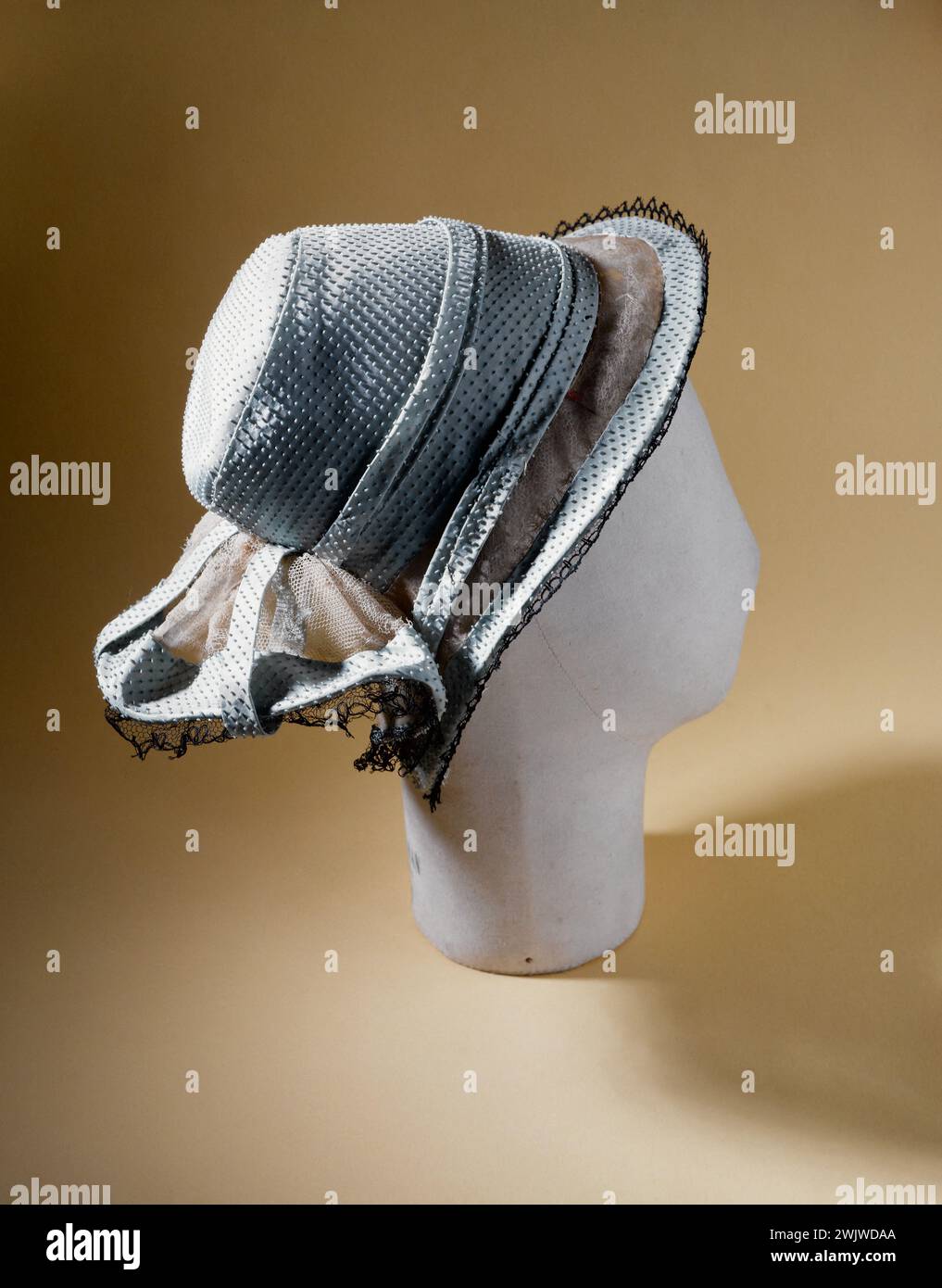 Turquoise silk hood and black whipped cream lace around 1860. Galliera, fashion museum of the ...