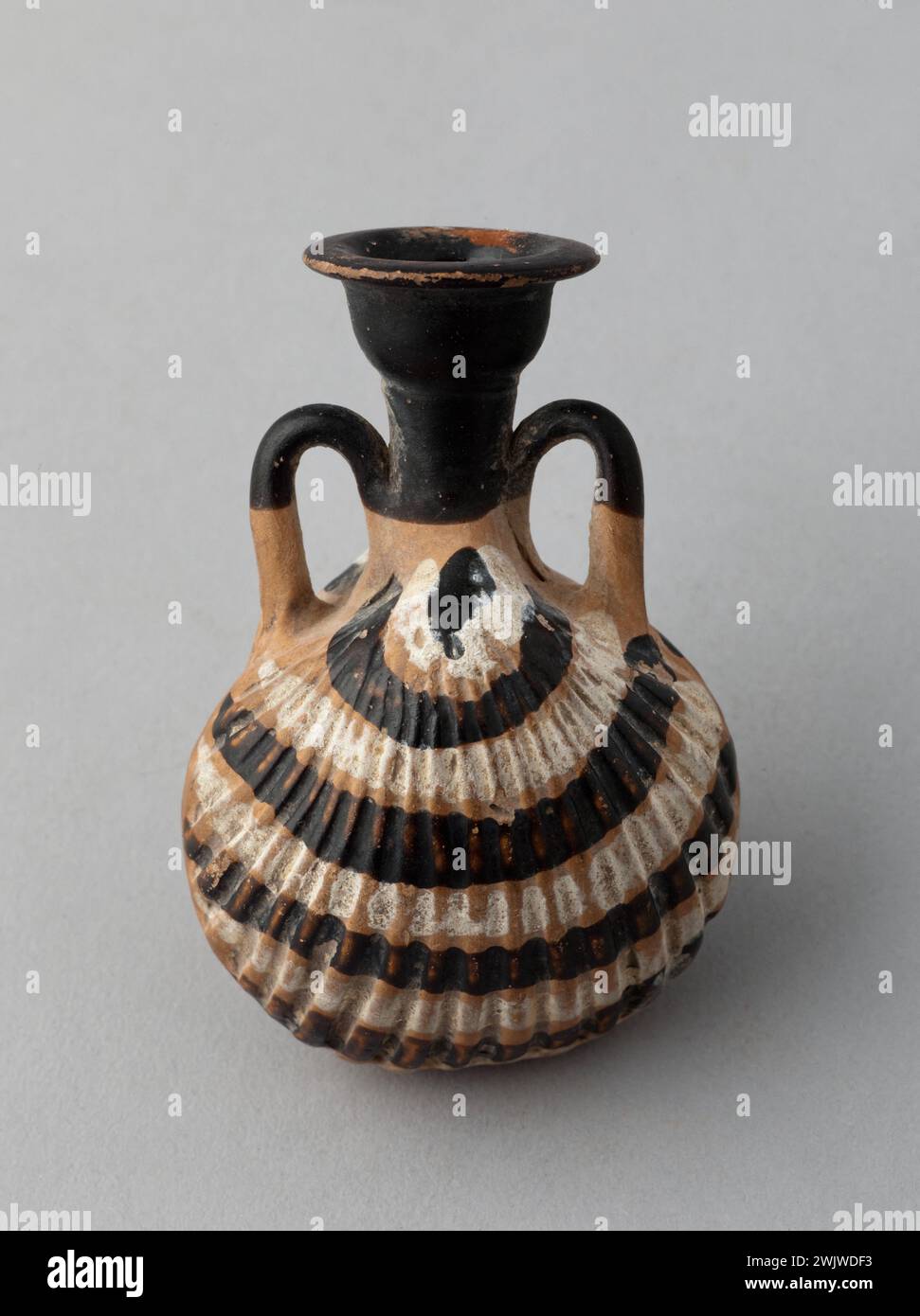 Amphorisque (small amphora) in the shape of a bivalve shell. Athens ...