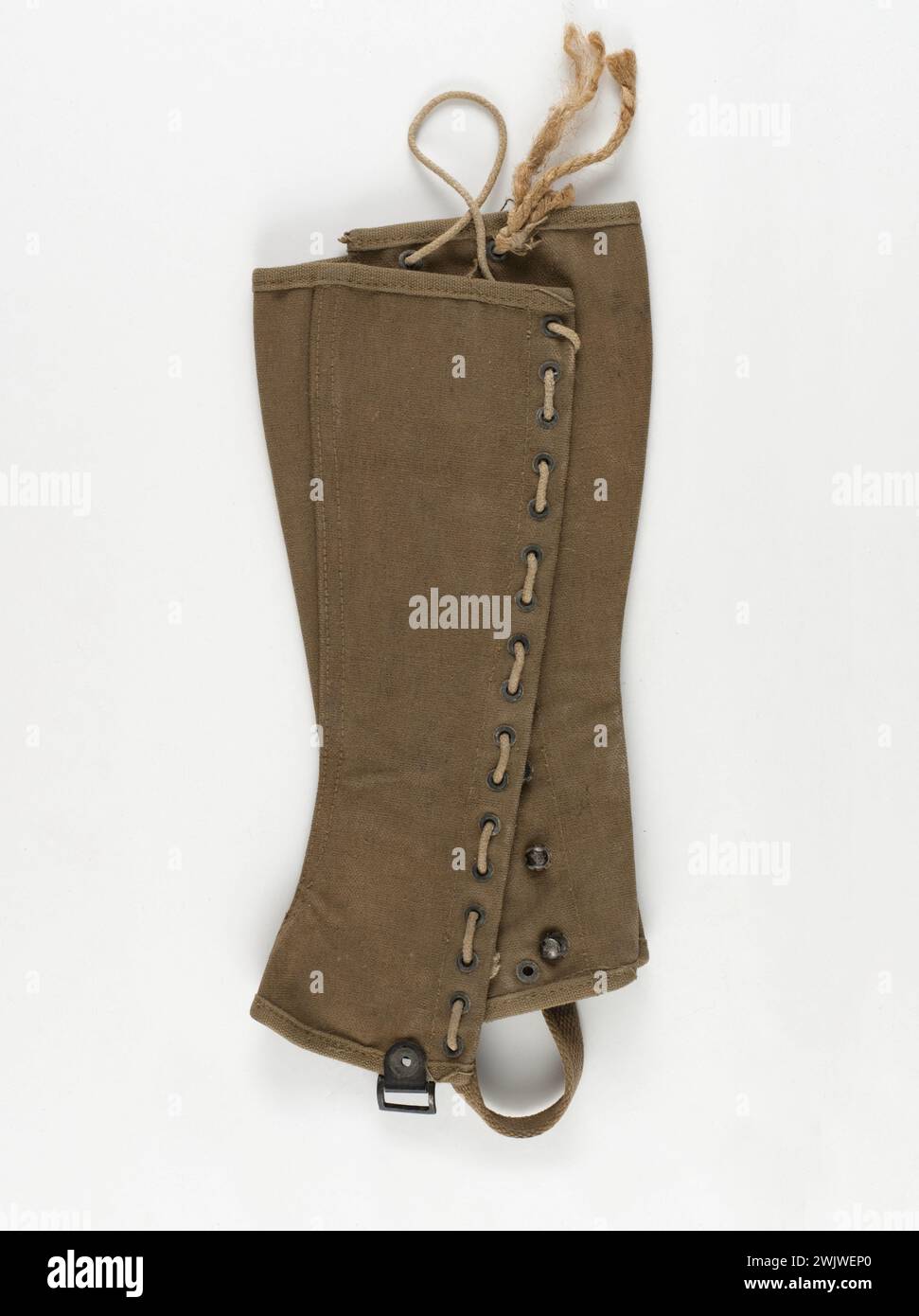 Gaiter. US m-38 gaitre. Canvas sewn machine, ink, painted metal, 1942 ...
