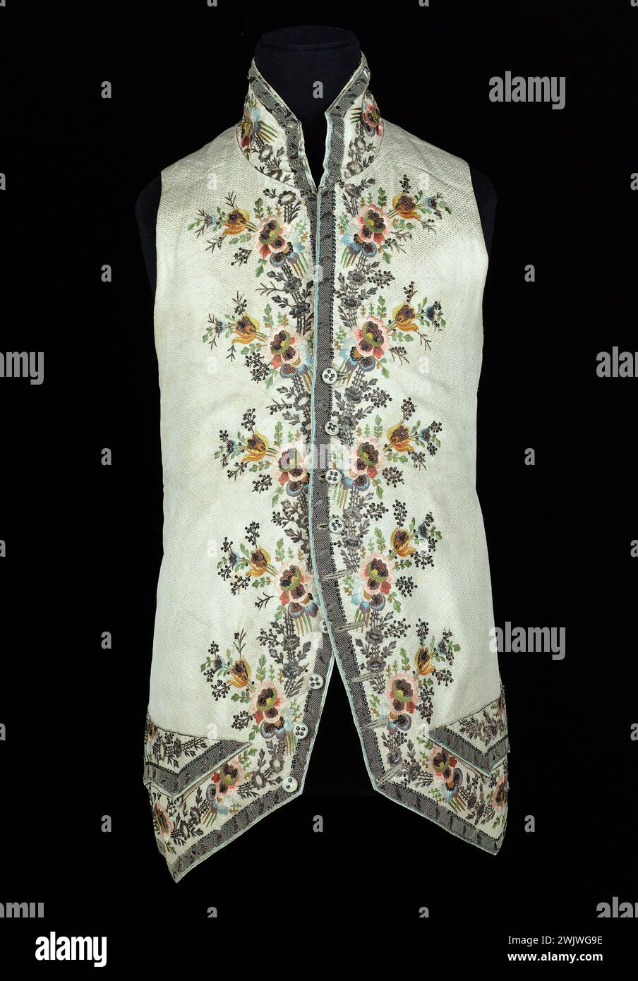 Vest. Small shaped cream, embroidery forming a network, application ...