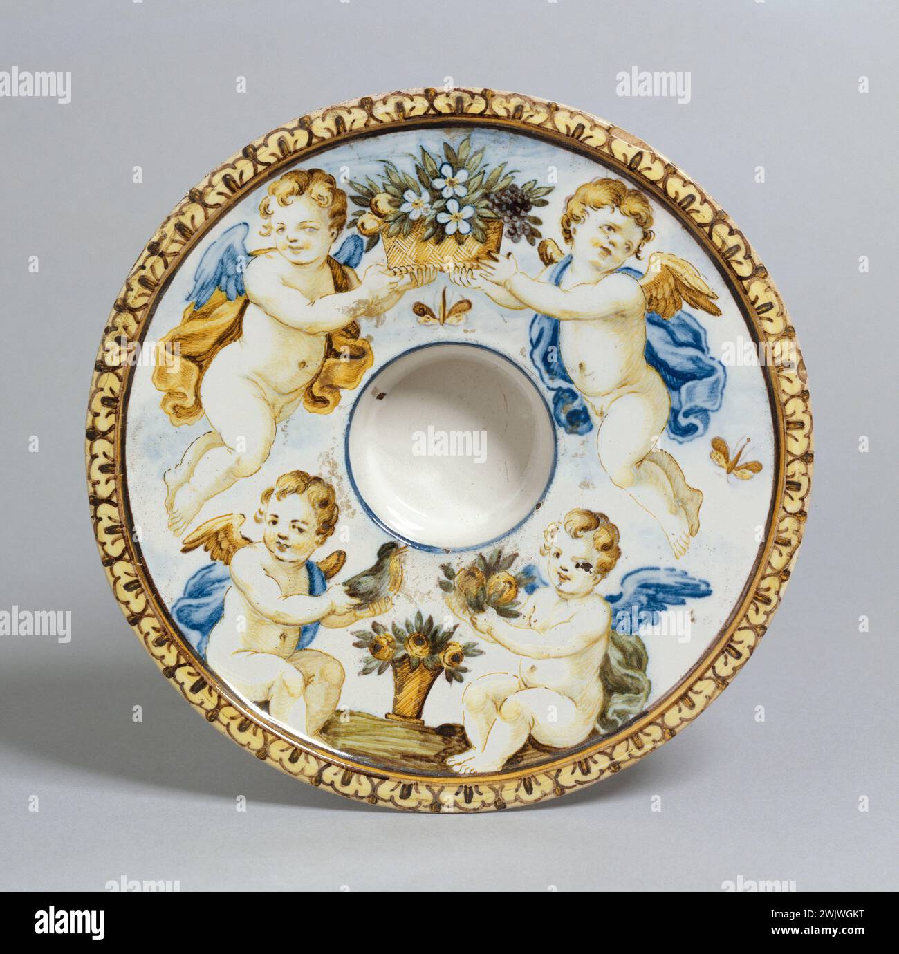 According to Carmine Gentili. Putti saucer, Italian majolica of ...