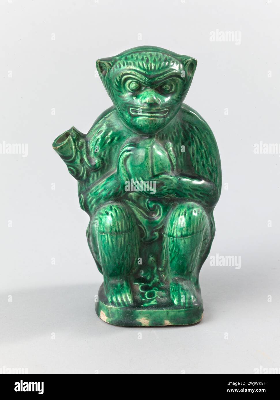 Monkey -shaped pourier. Green covered sandstone. Paris, Cernuschi ...