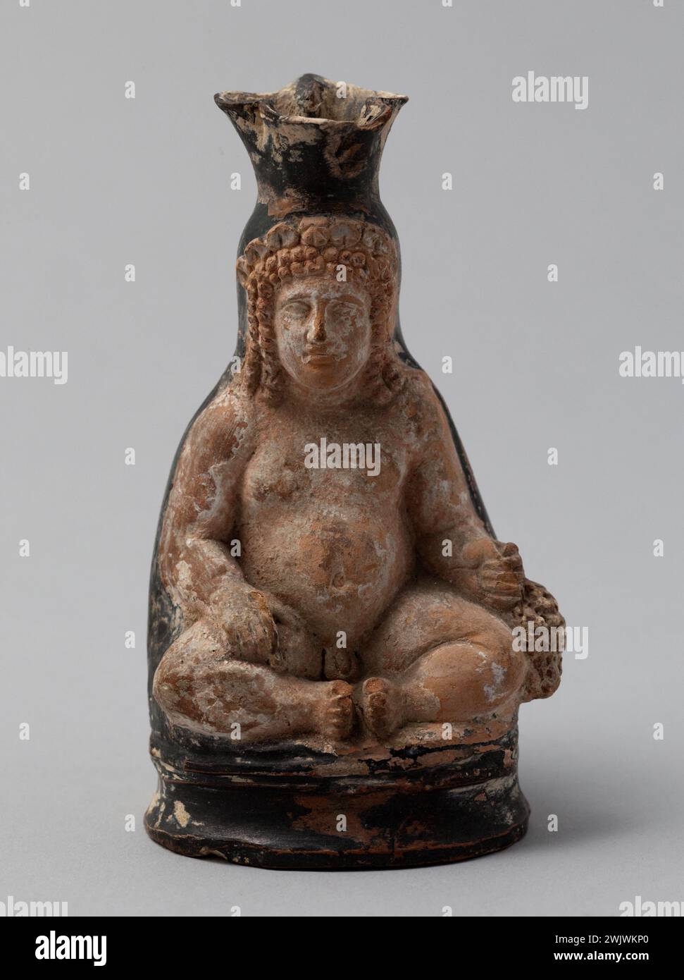Oenochoé in the shape of a seated bacchus. Molded terracotta. Athens ...