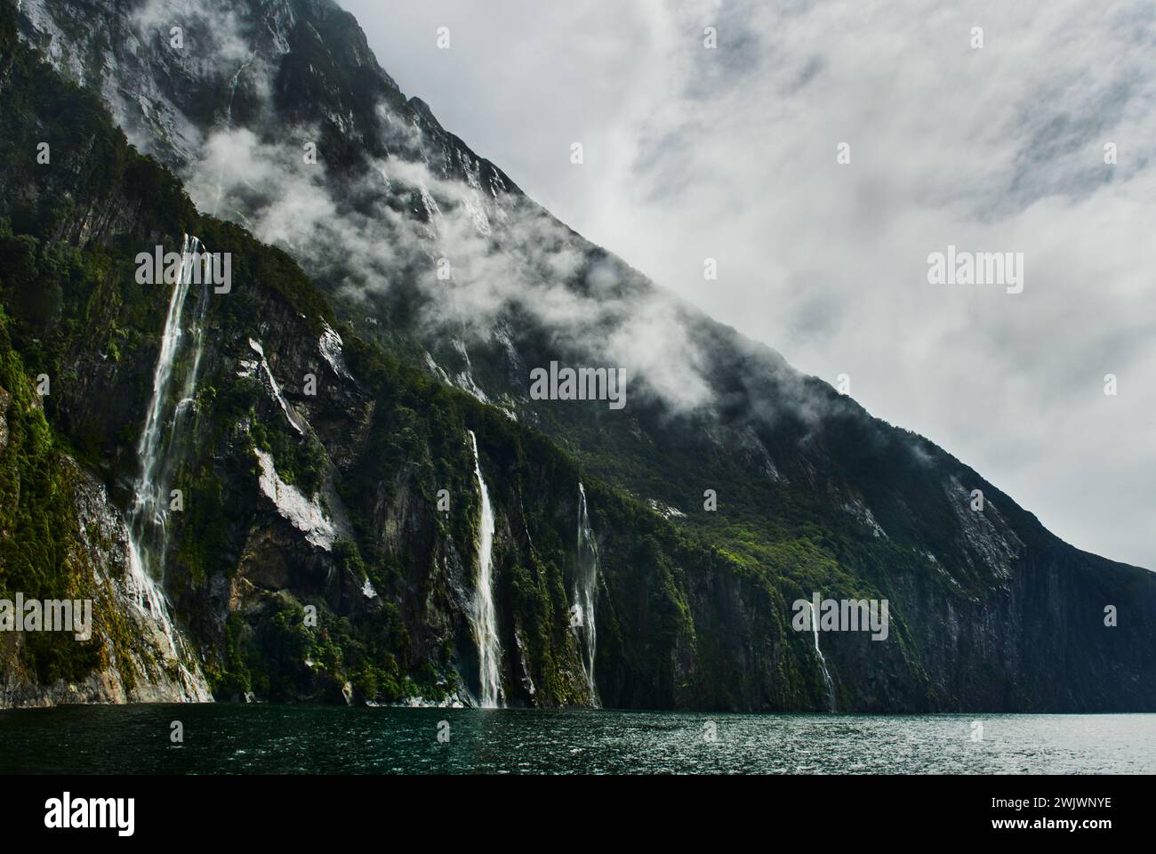 Waterfalls in Milford Sound / Piopiotahi, South Island, New Zealand ...