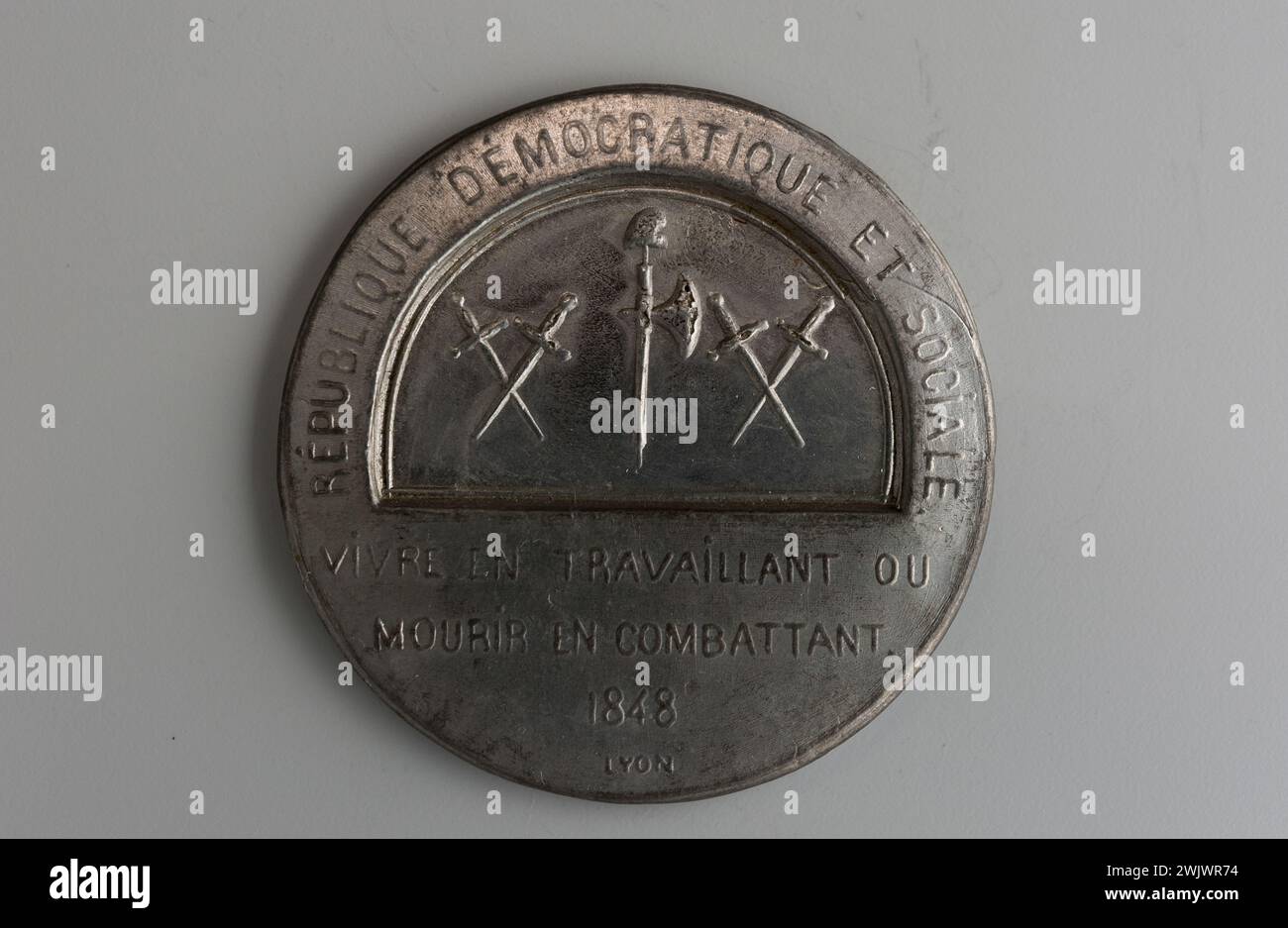 Carnavalet museum, medal collection Right an ax topped with a Phrygian ...